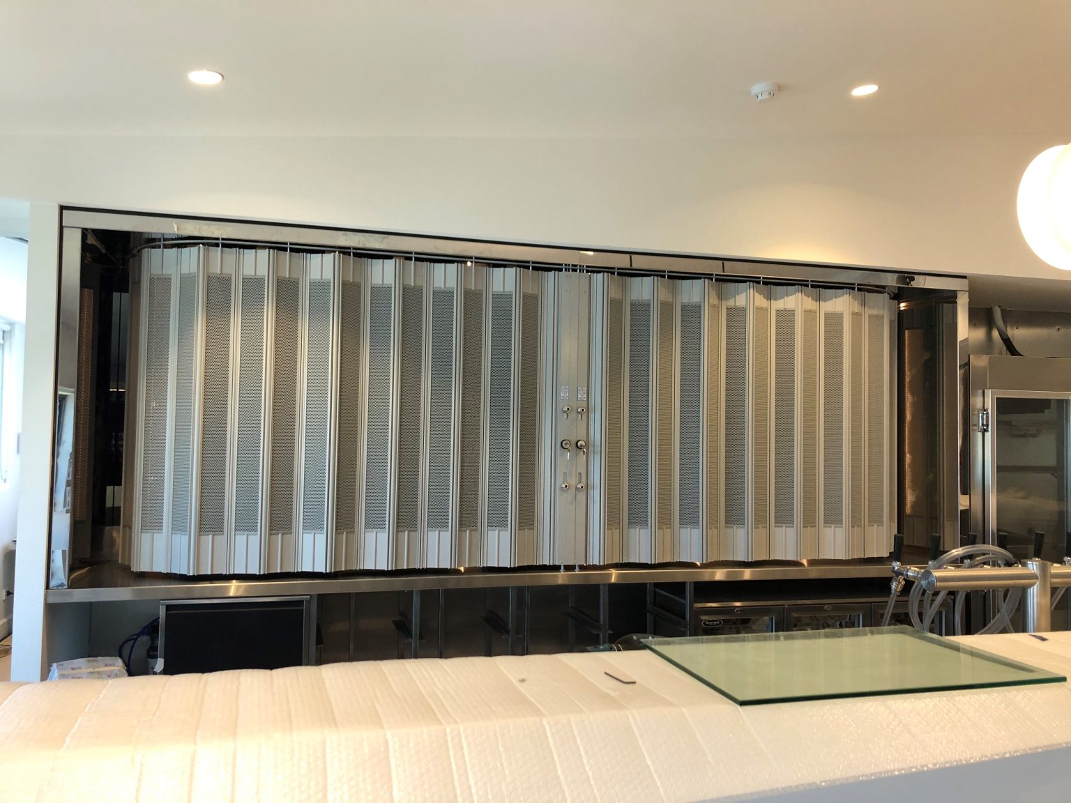 Stylish,functional perforated concertina doors maximize airflow ...